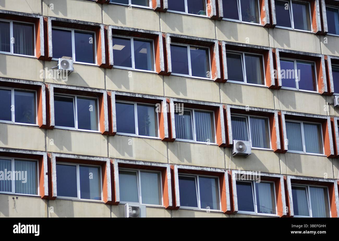 Facade of an old soviet residential, office building with repetitive ...