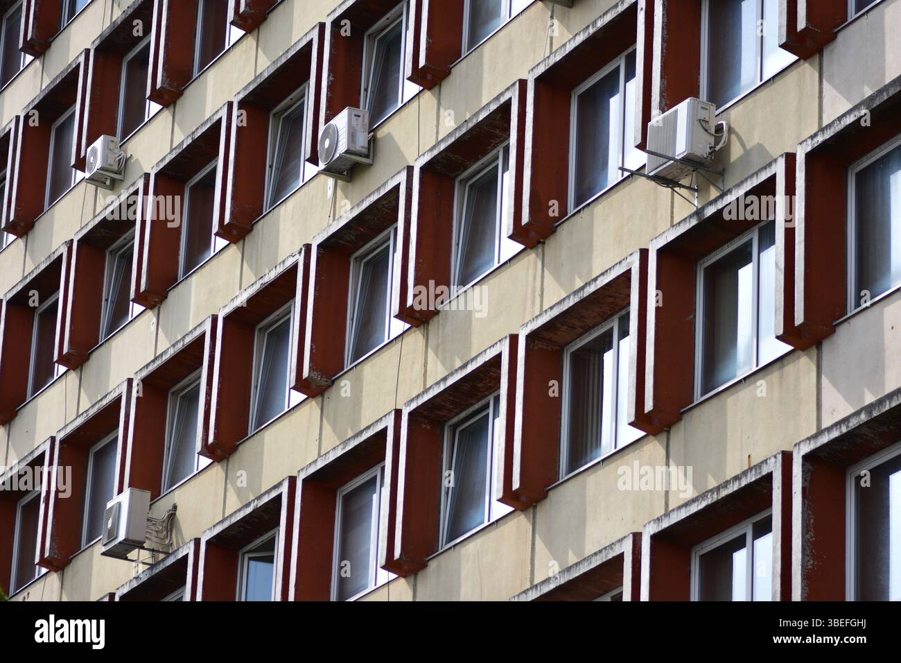 Facade of an old soviet residential, office building with repetitive ...