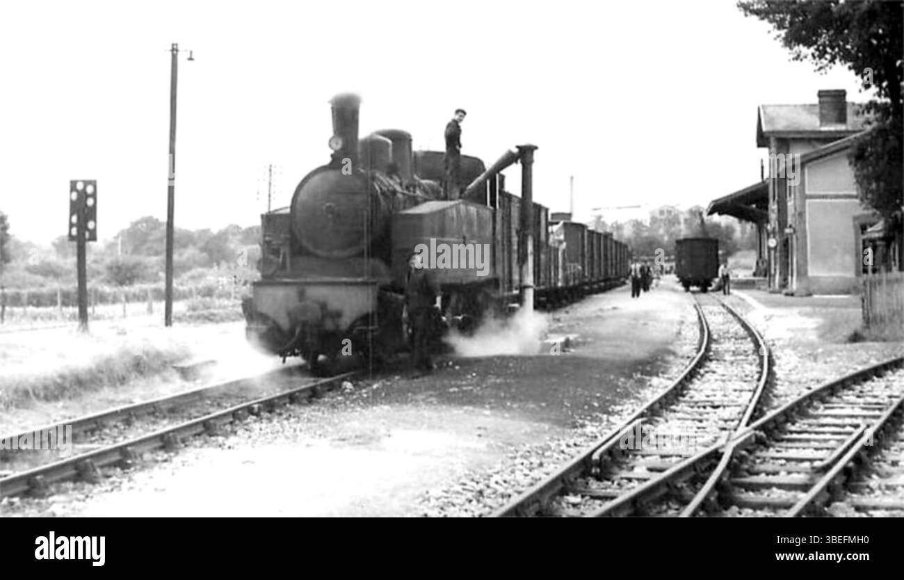 This circa 1925 postcard depicts the train station in Scaër. The image ...