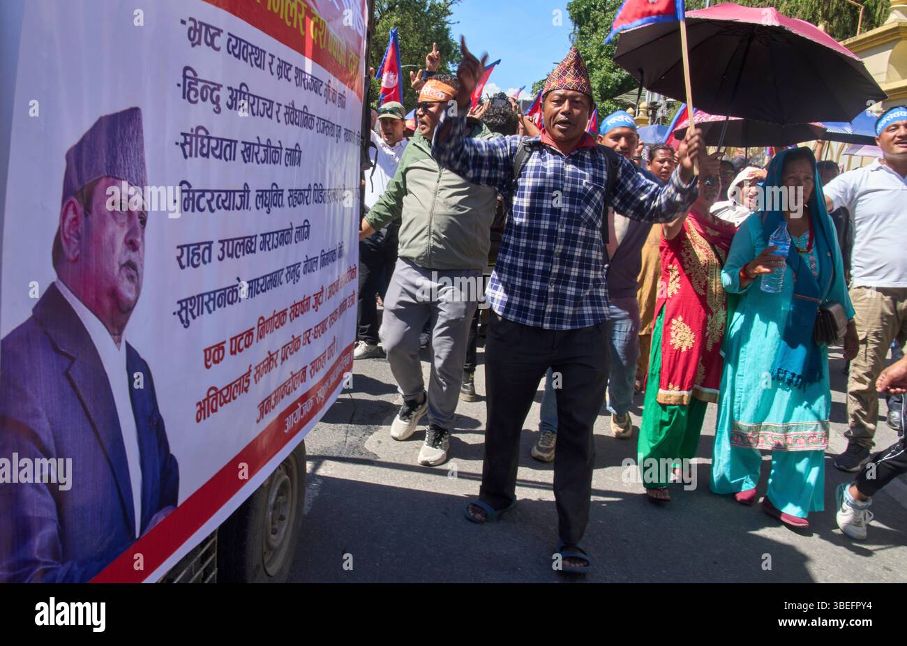 Pro-monarchy supporters take part in a rally calling for the ...