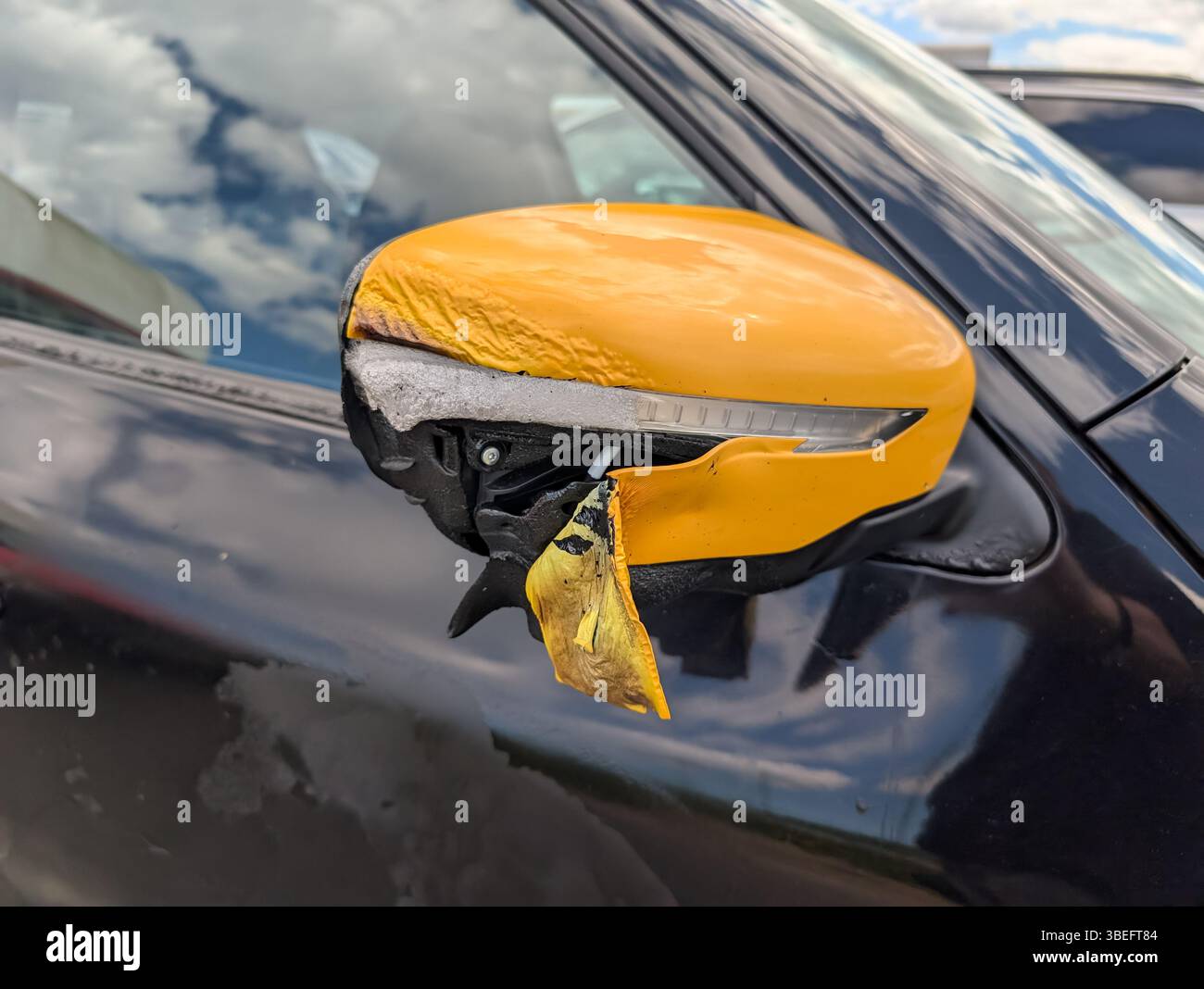 Melted Car Side Mirror After Fire: Close-up of Fire Damage Stock Photo ...