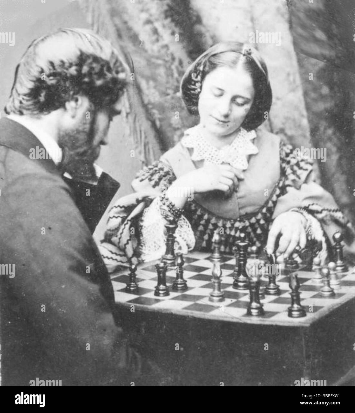 A depiction of a chess game in England around 1860. This scene captures ...