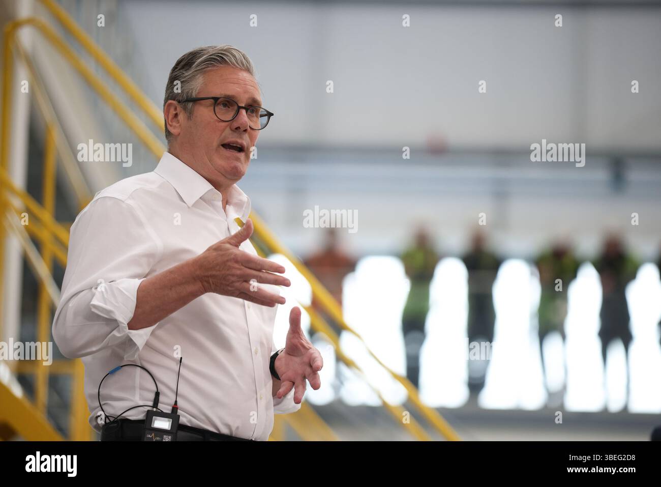 Prime Minister Sir Keir Starmer speaks to workers during a visit to ...