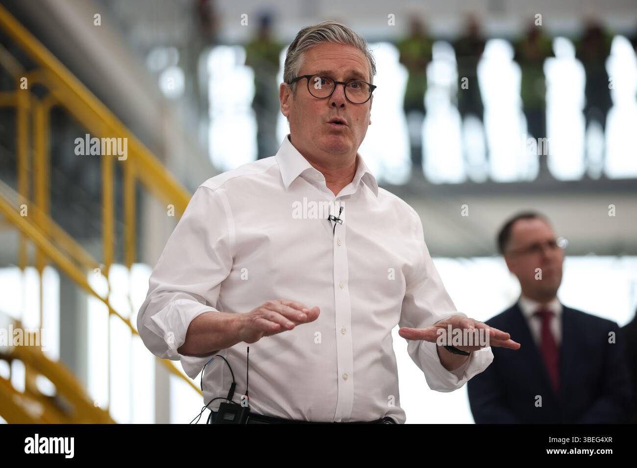 Prime Minister Sir Keir Starmer speaks to workers during a visit to ...