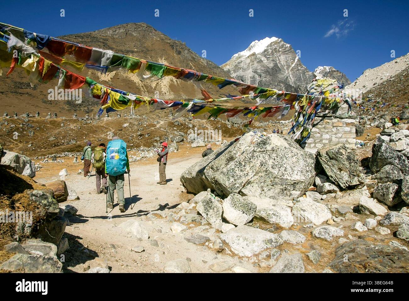 Mount Everest trekking route, monument to dead mountaineers. Sagarmatha ...