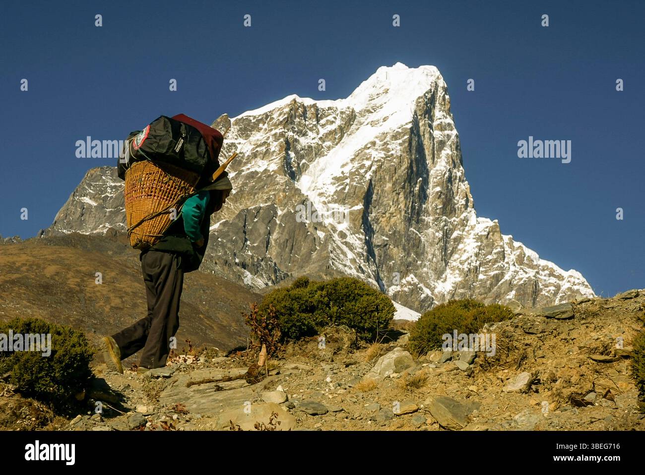 porter in Periche Valley.mount Everest trekking route,. Sagarmatha ...