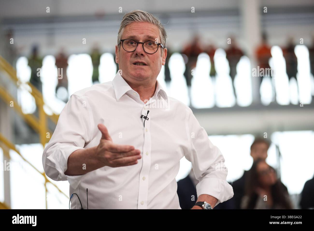 Prime Minister Sir Keir Starmer speaks to workers during a visit to ...