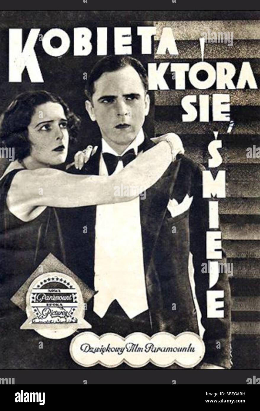 This 1931 film poster is for *Kobieta, Która Sie Mieje* (translated: The Woman Who Laughs), a ...