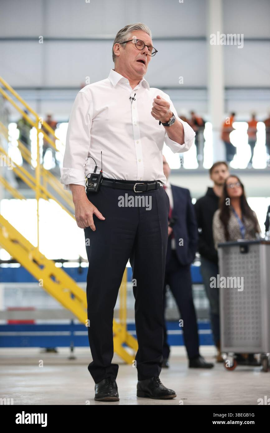 Prime Minister Sir Keir Starmer speaks to workers during a visit to ...