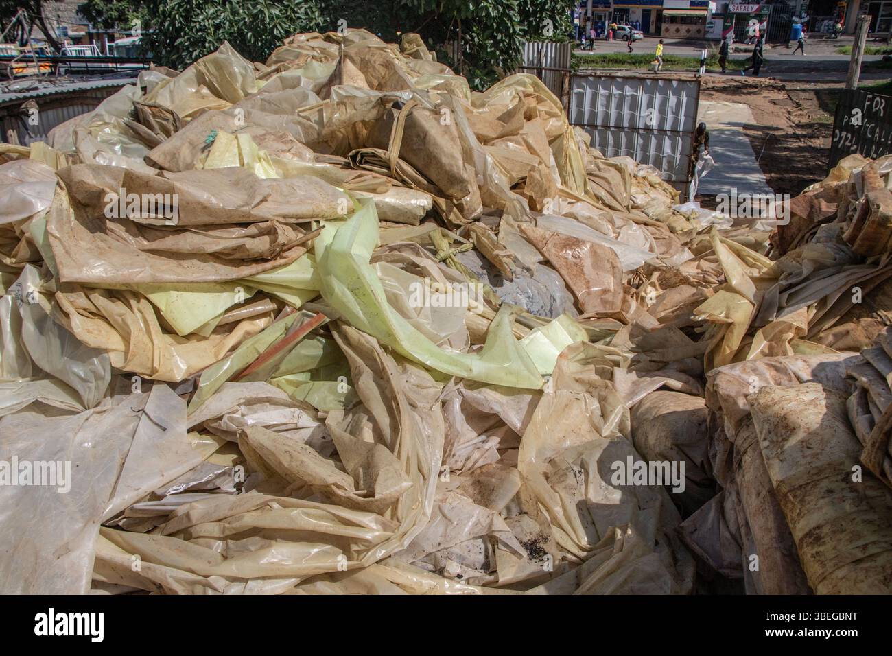 A man is seen working at a greenhouse plastic waste collection center ...
