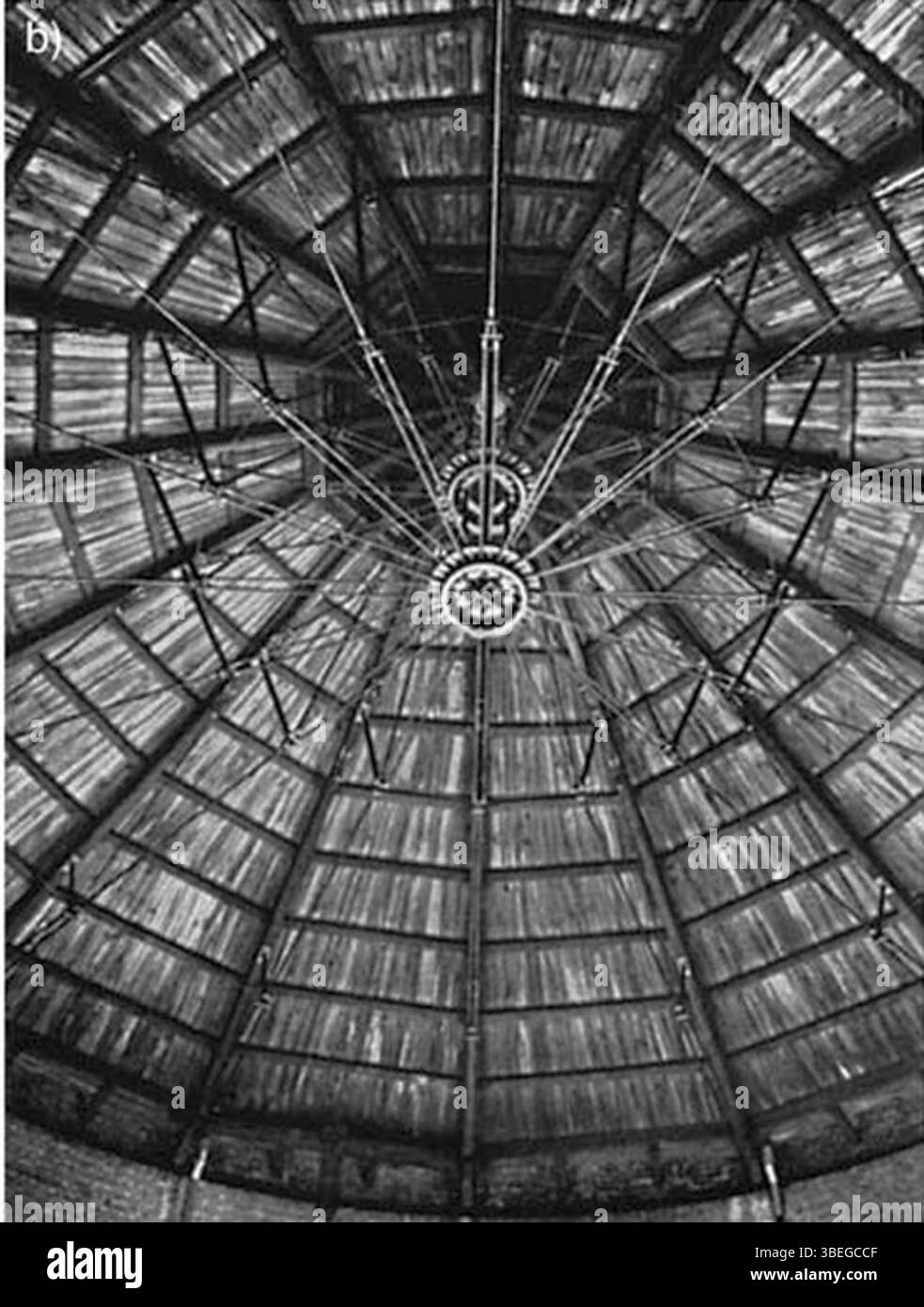The 1932 image features the radial iron truss roof construction of the ...