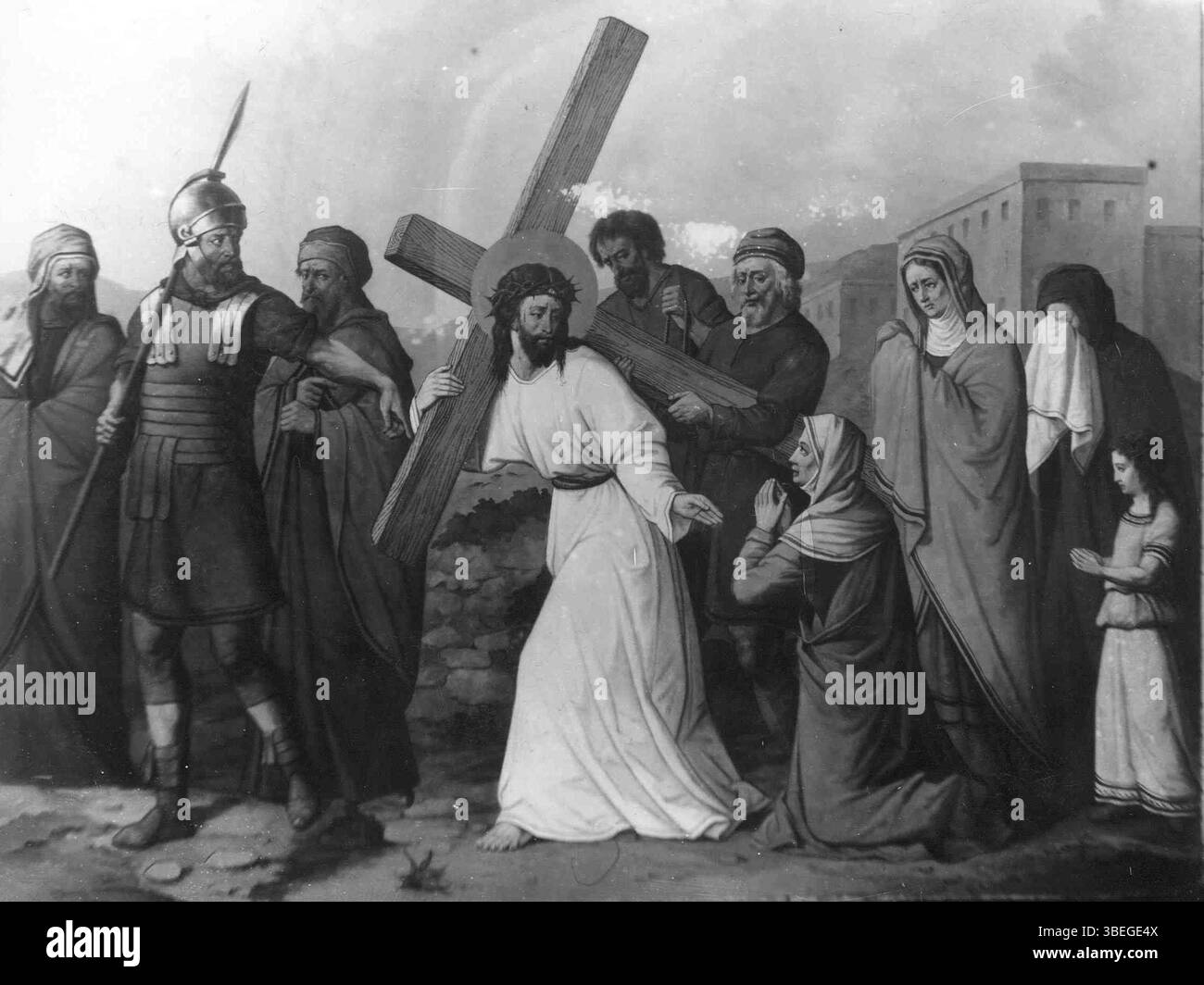 This photograph depicts a scene from the Stations of the Cross, showing ...