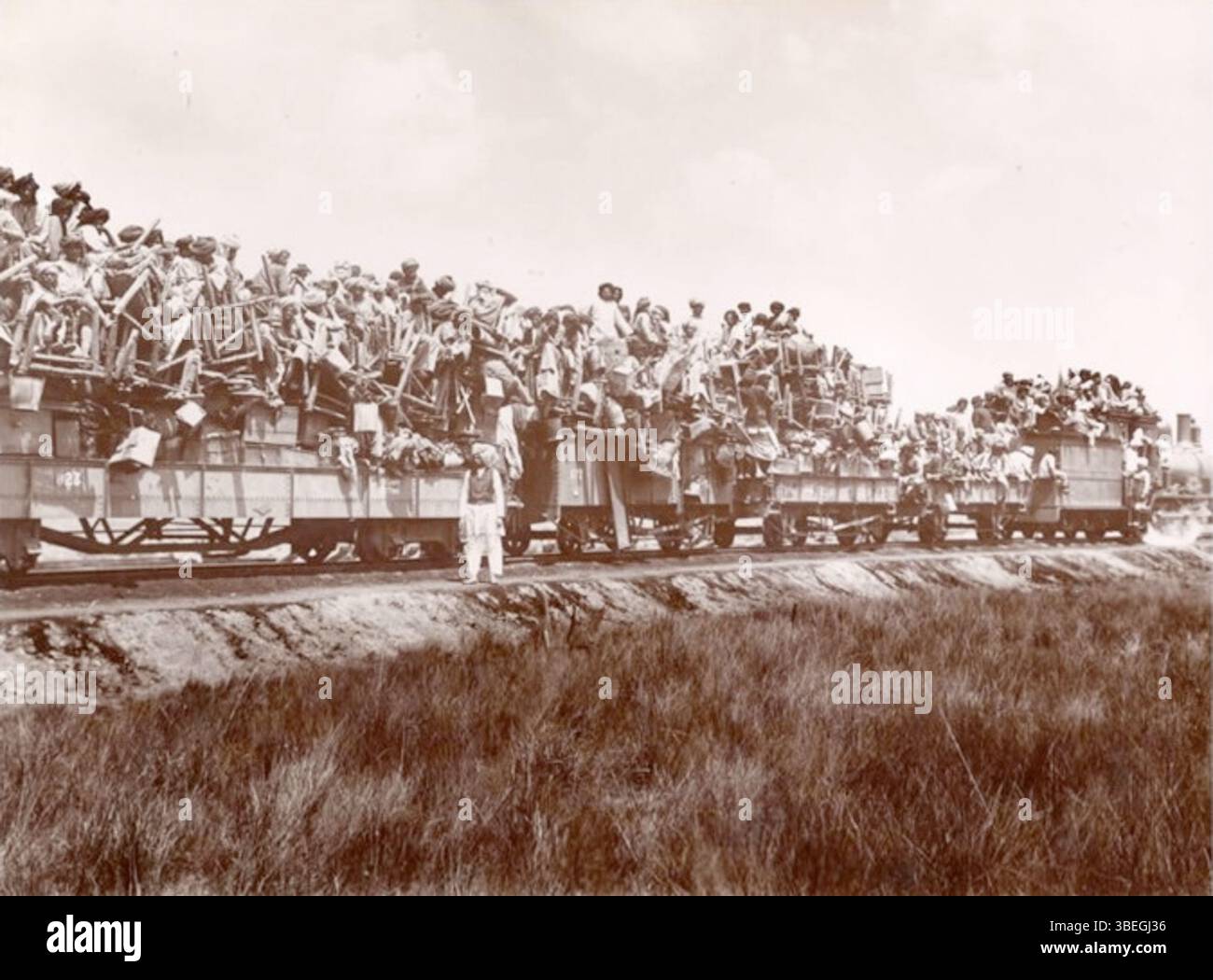 This photograph, taken in the 1920s or 1930s, shows the plate-laying ...