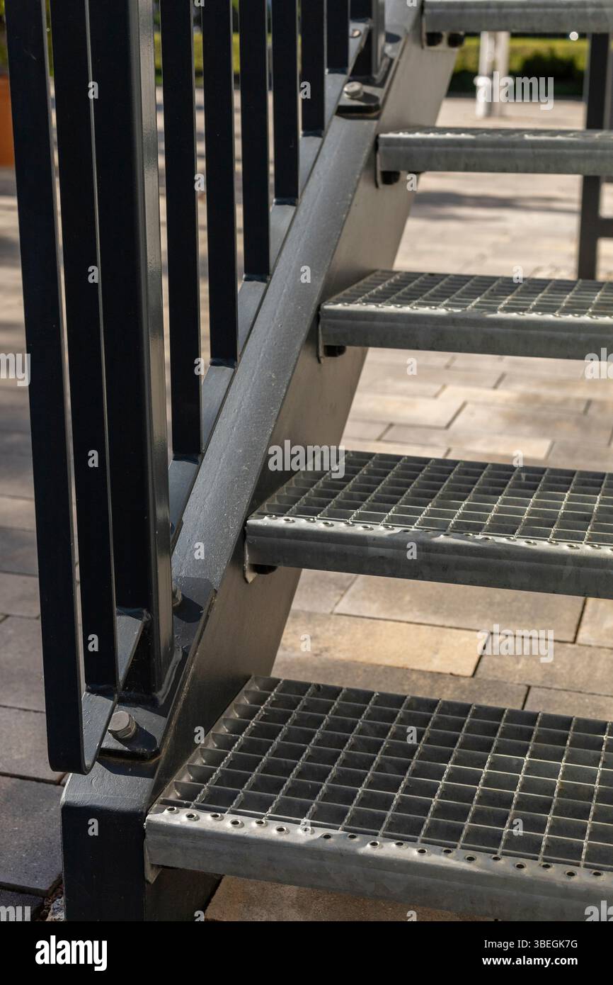 Sturdy metal stairs provide access to raised platform situated in sunny ...