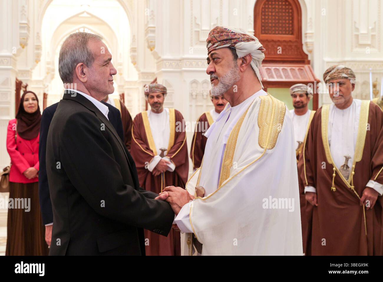 Sultan Haitham bin Tariq of Oman bids farewell to President Masoud Pezeshkian of the Islamic ...
