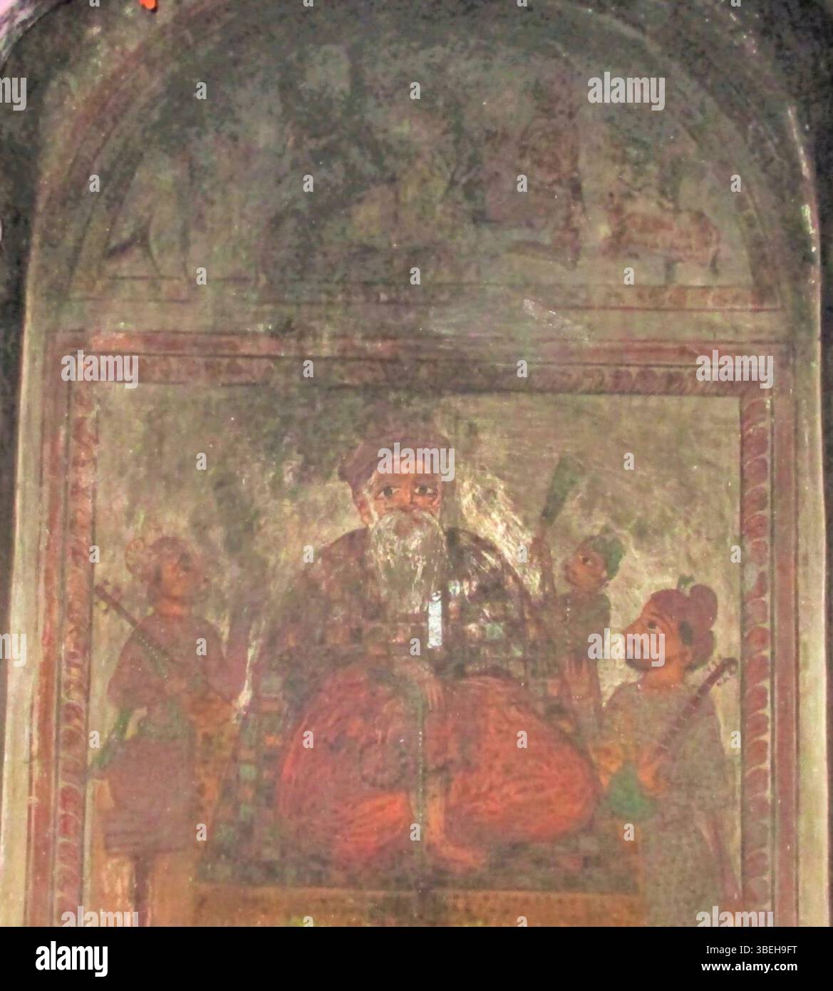 This mural shows Guru Nanak surrounded by his attendants within a ...