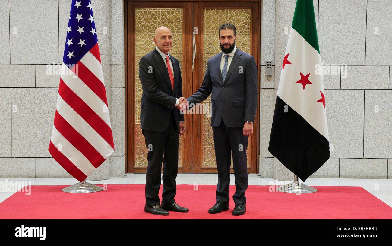 In this photo released by the Syrian official news agency SANA, Syria's ...