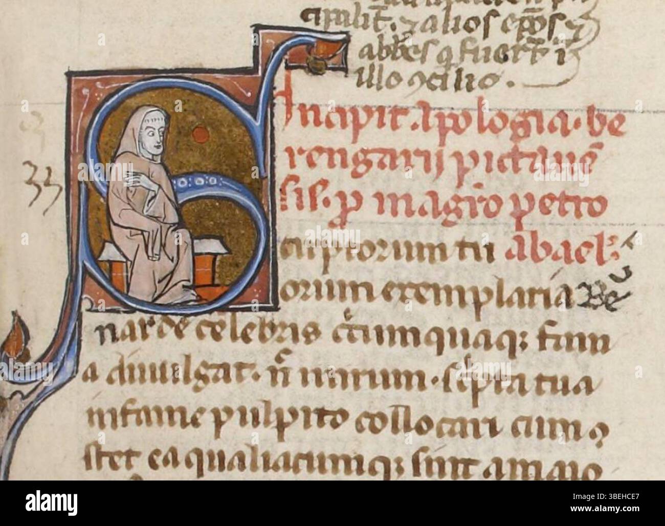 This manuscript page features an ornate initial from *Paris, Bibl. nat ...