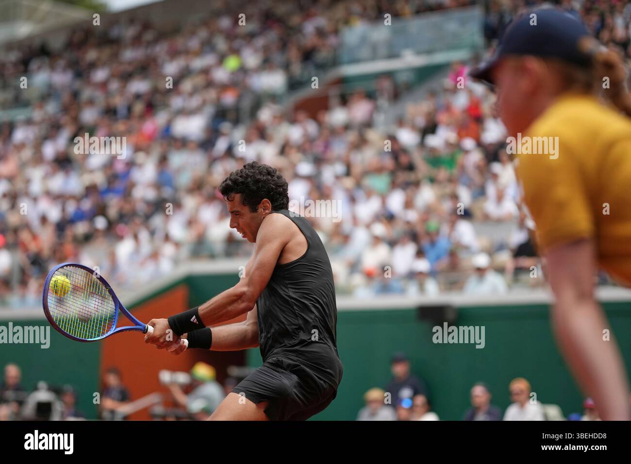 Spain's Jaume Munar returns the ball to France's Arthur Fils during ...