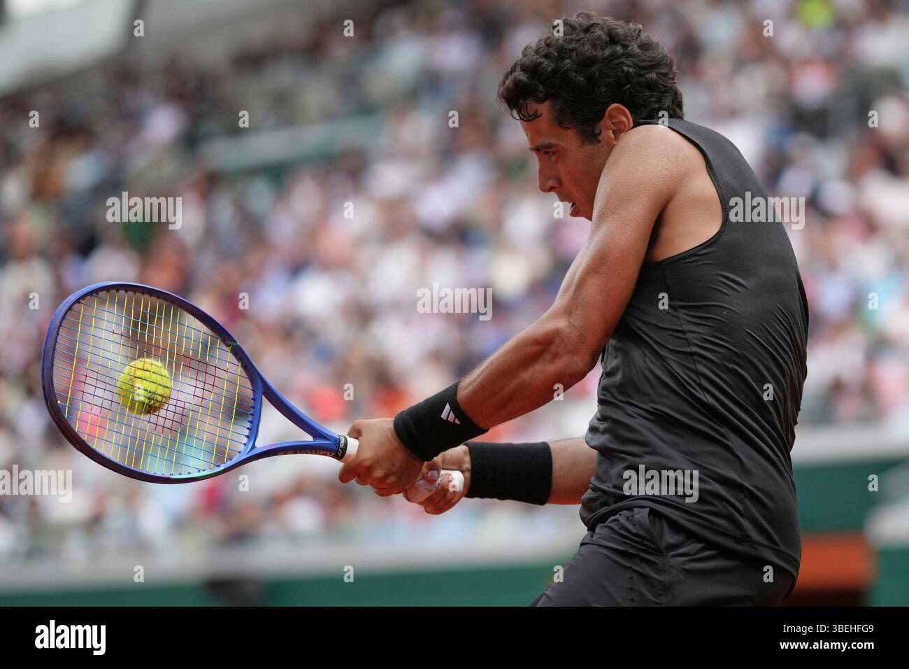 Spain's Jaume Munar returns the ball to France's Arthur Fils during ...
