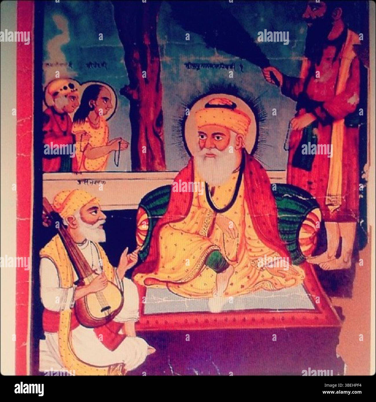 Early 20th-century painting by Gian Singh Naqqash showing Guru Nanak seated under a tree with ...