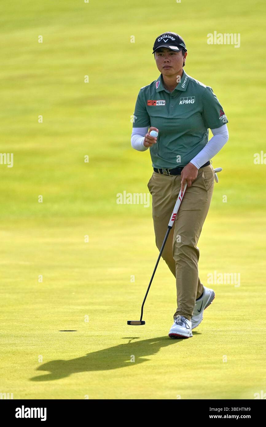 Yuka Saso, of Japan, reacts on the 11th hole during the first round of ...