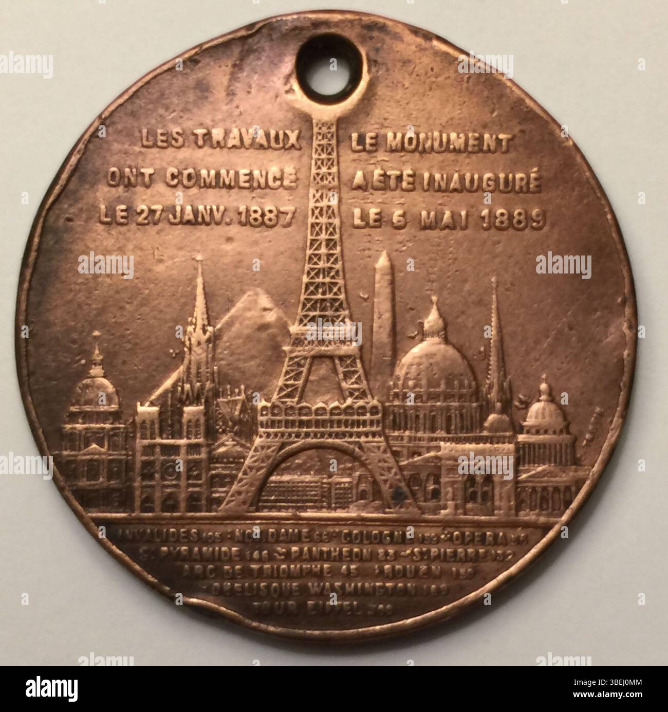 This souvenir medal commemorates the completion of the Eiffel Tower in ...