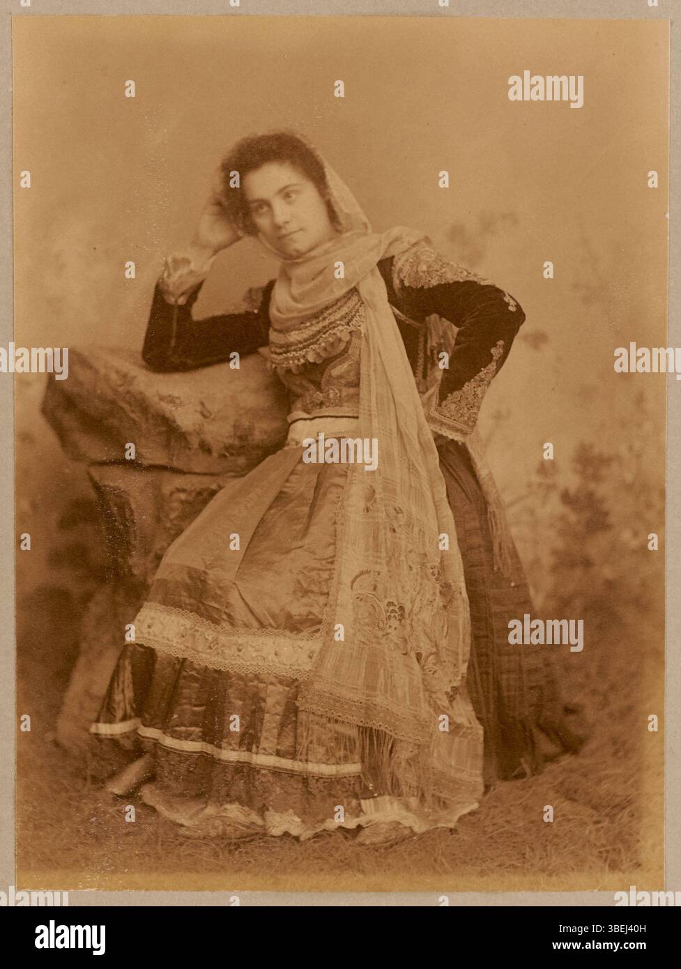 A studio portrait featuring a woman in traditional Greek dress from the ...