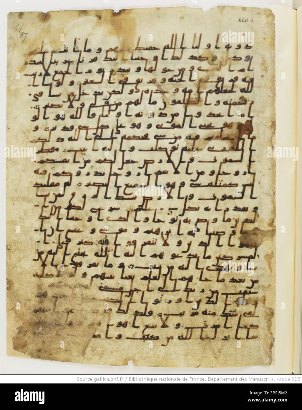 This 7th-century Quran manuscript, labeled *Coran AR328d*, showcases an ...
