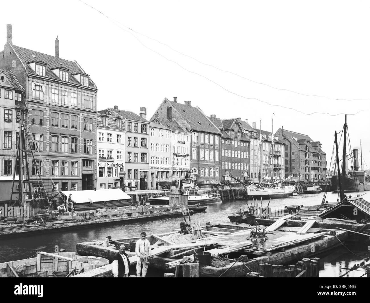 This photograph, taken by Johannes Hauerslev, shows Nyhavn, a famous ...