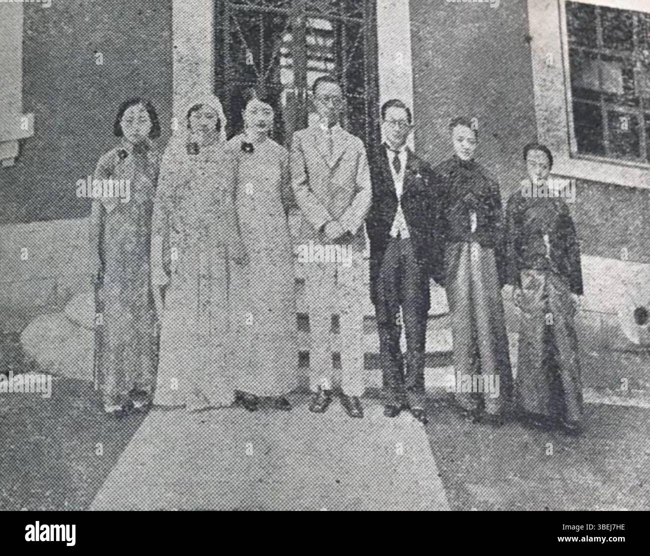 This historical photograph captures Wanrong and Puyi, perhaps at her ...