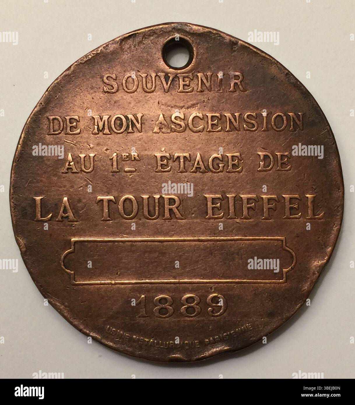 This souvenir medal commemorates a visit to the first floor of the ...