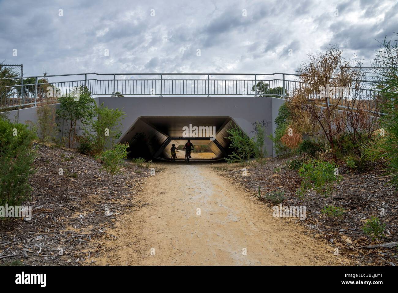 Father son walking under tunnel hi-res stock photography and images - Alamy