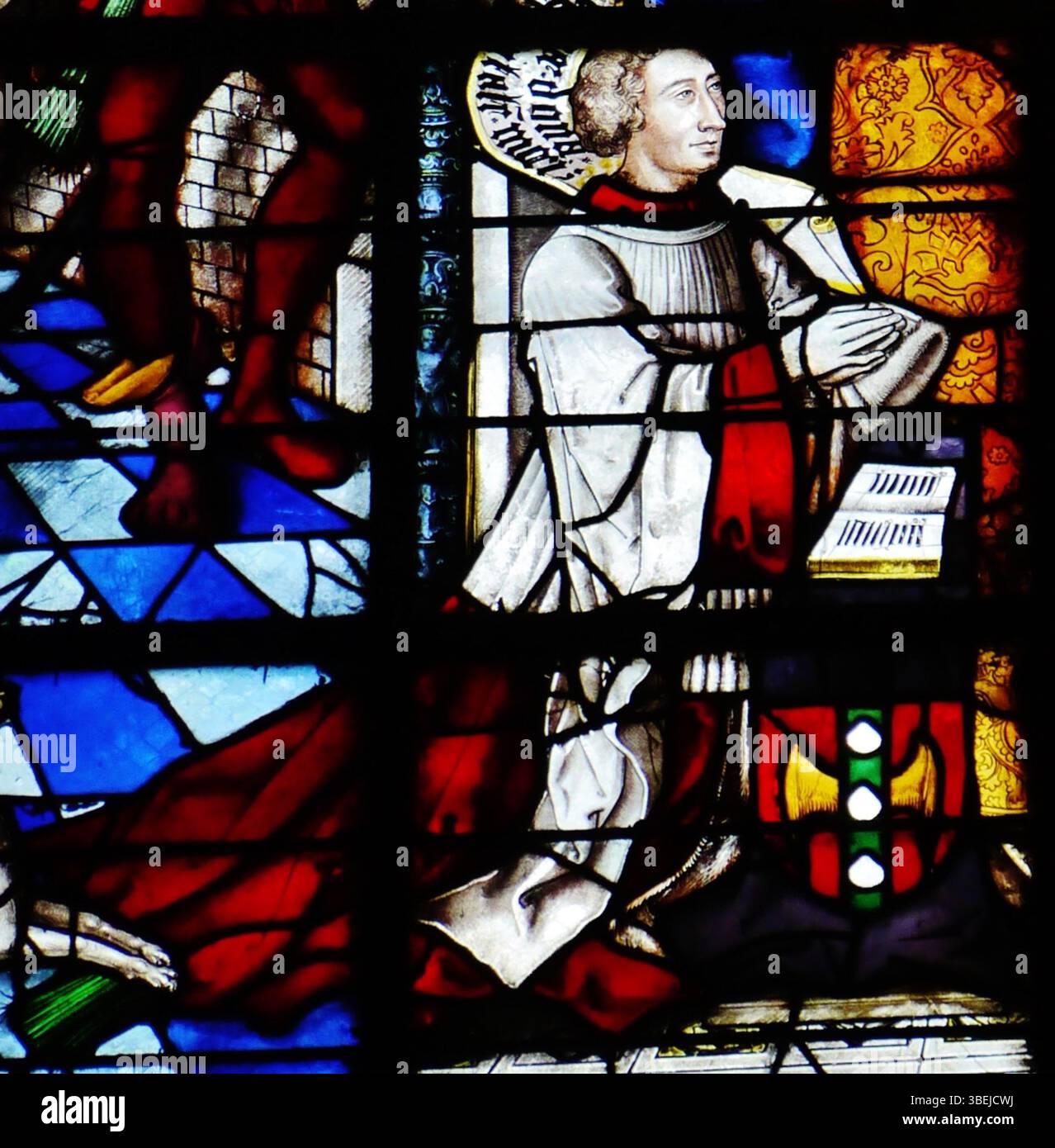 This stained-glass window at the Basilica of Saint-Quentin depicts ...