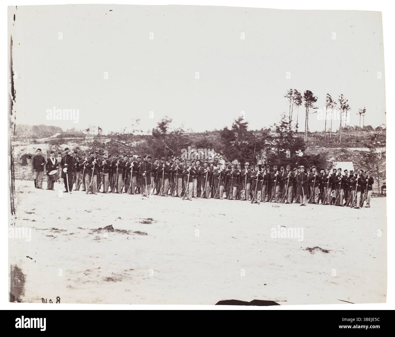 This photograph, attributed to Mathew B. Brady, shows a line of ...