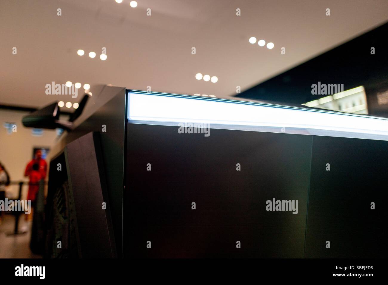 Low-angle view of front light and grill of Tesla Cybertruck, San Jose ...