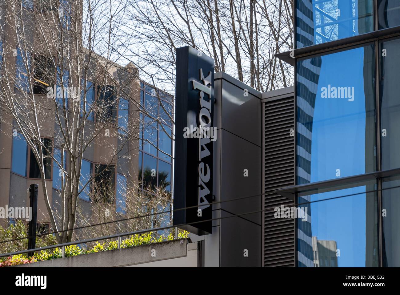 Exterior of commercial building featuring prominent WeWork signage and ...