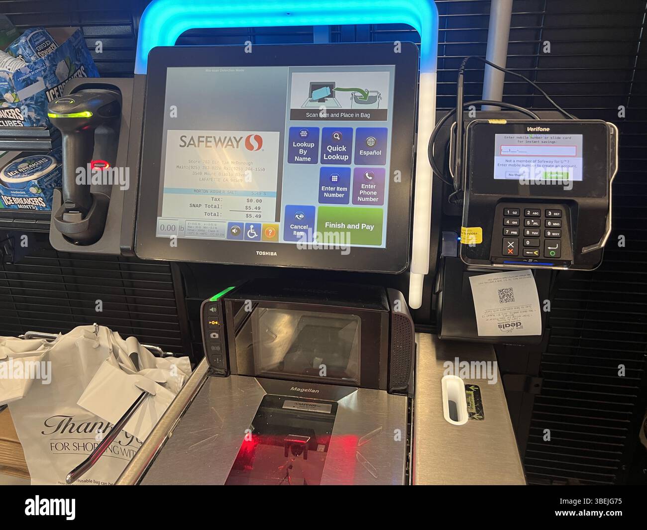 Self-checkout kiosk with scanner, card reader, and touchscreen ...