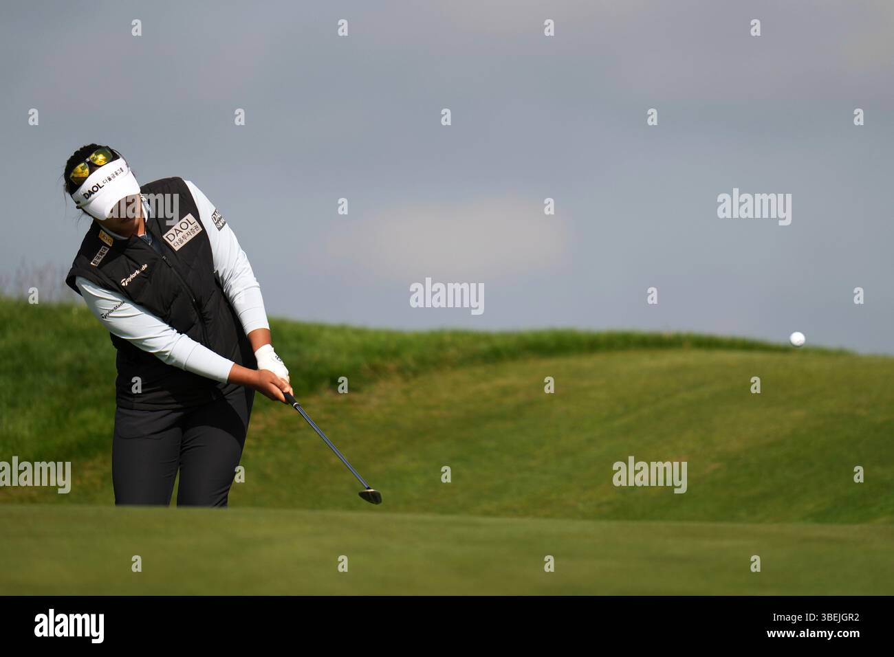 Haeran Ryu, of South Korea, chips to the sixth green during the first ...