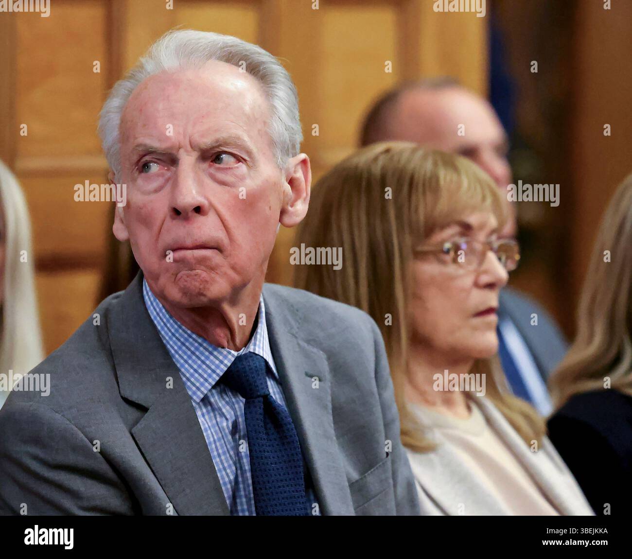 William Read, father of defendant Karen Read, listens as prosecutor Hank Brennan speaks during ...