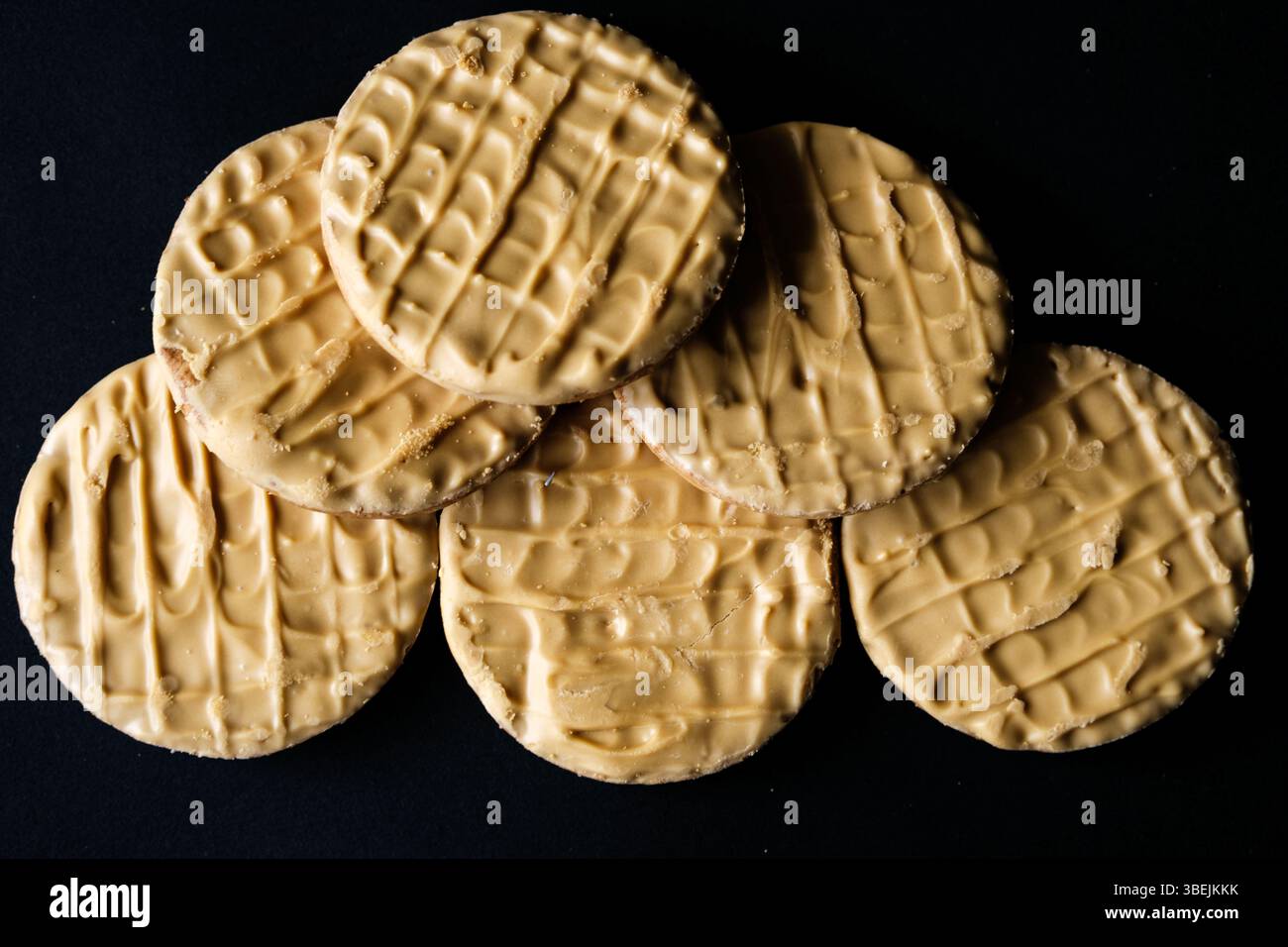 London UK, May 29 2025, A Pile or Group of Traditional Digestive Gold ...