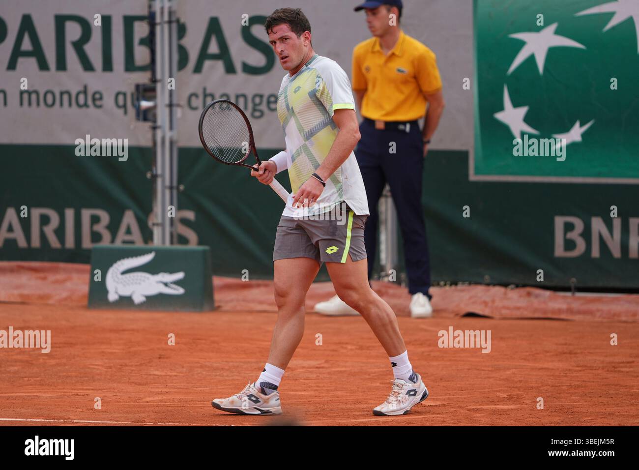 Argentina's Federico Gomez reacts as he plays Britain's Cameron Norrie ...