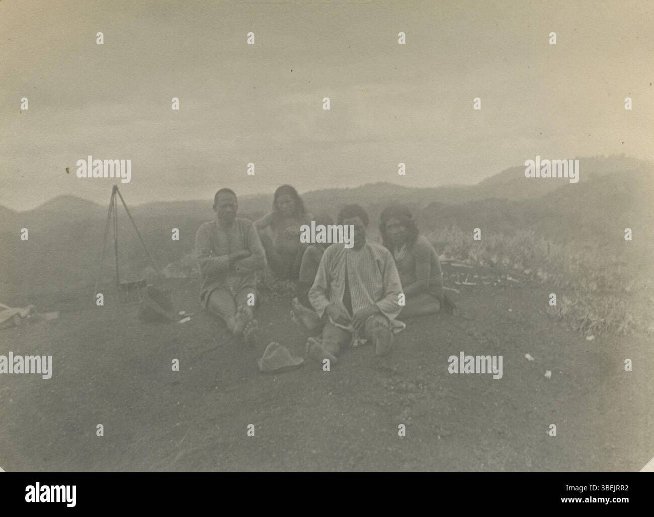 This image depicts members of an expedition with indigenous people at ...