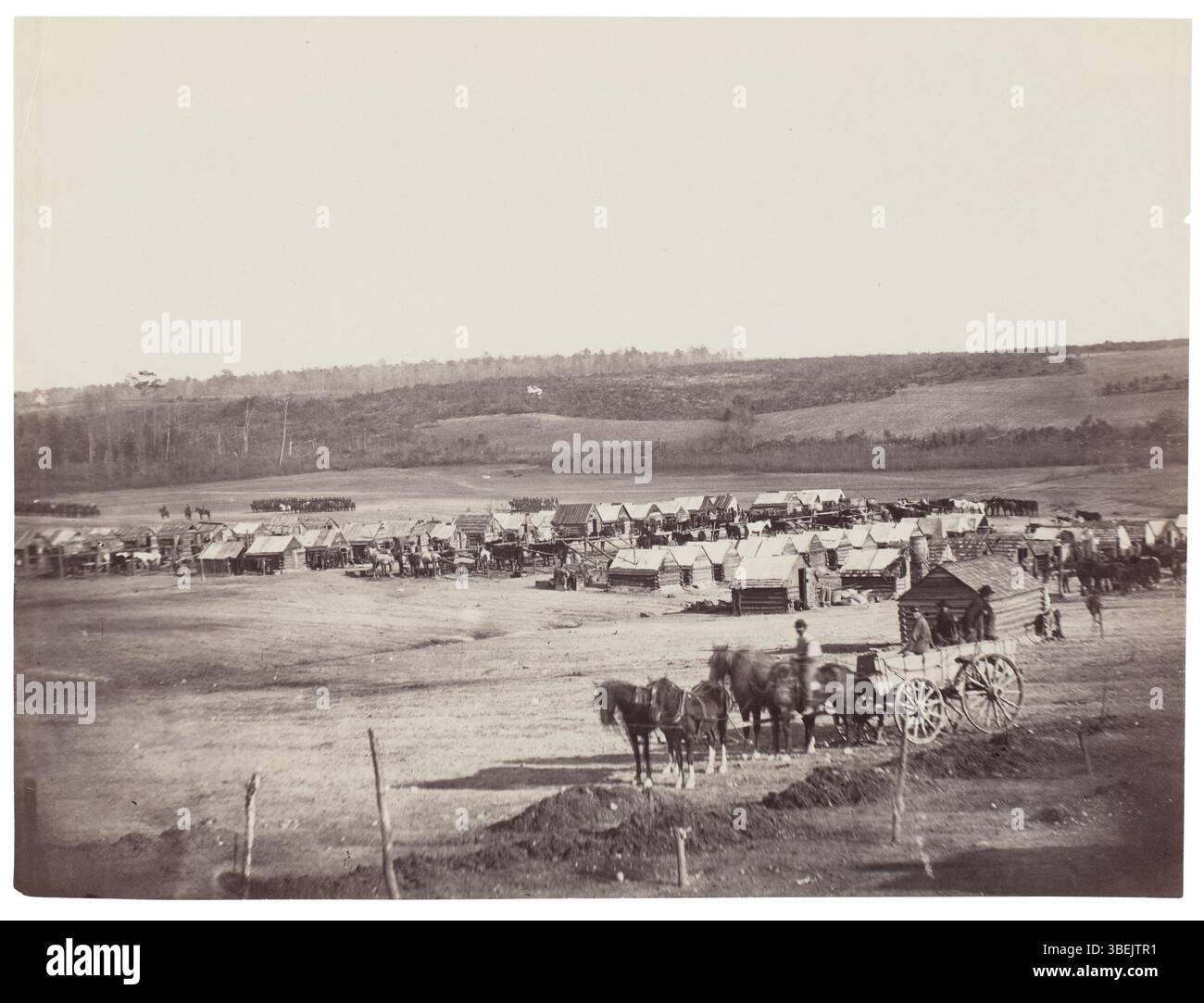 This photograph captures the winter quarters of a cavalry regiment in the Army of the Potomac ...