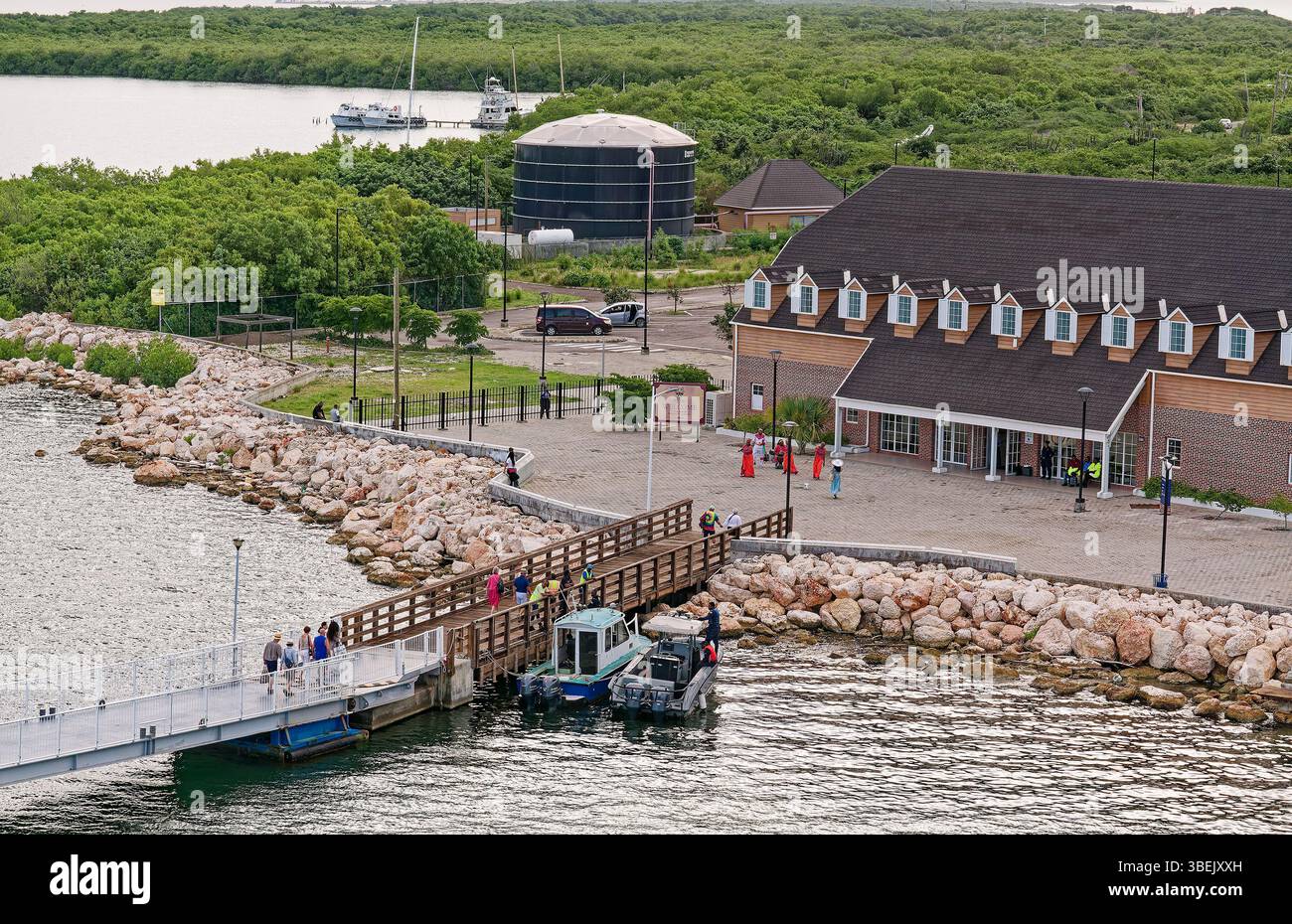 moveable bridge from cruise ship, people going ashore, musicians and ...