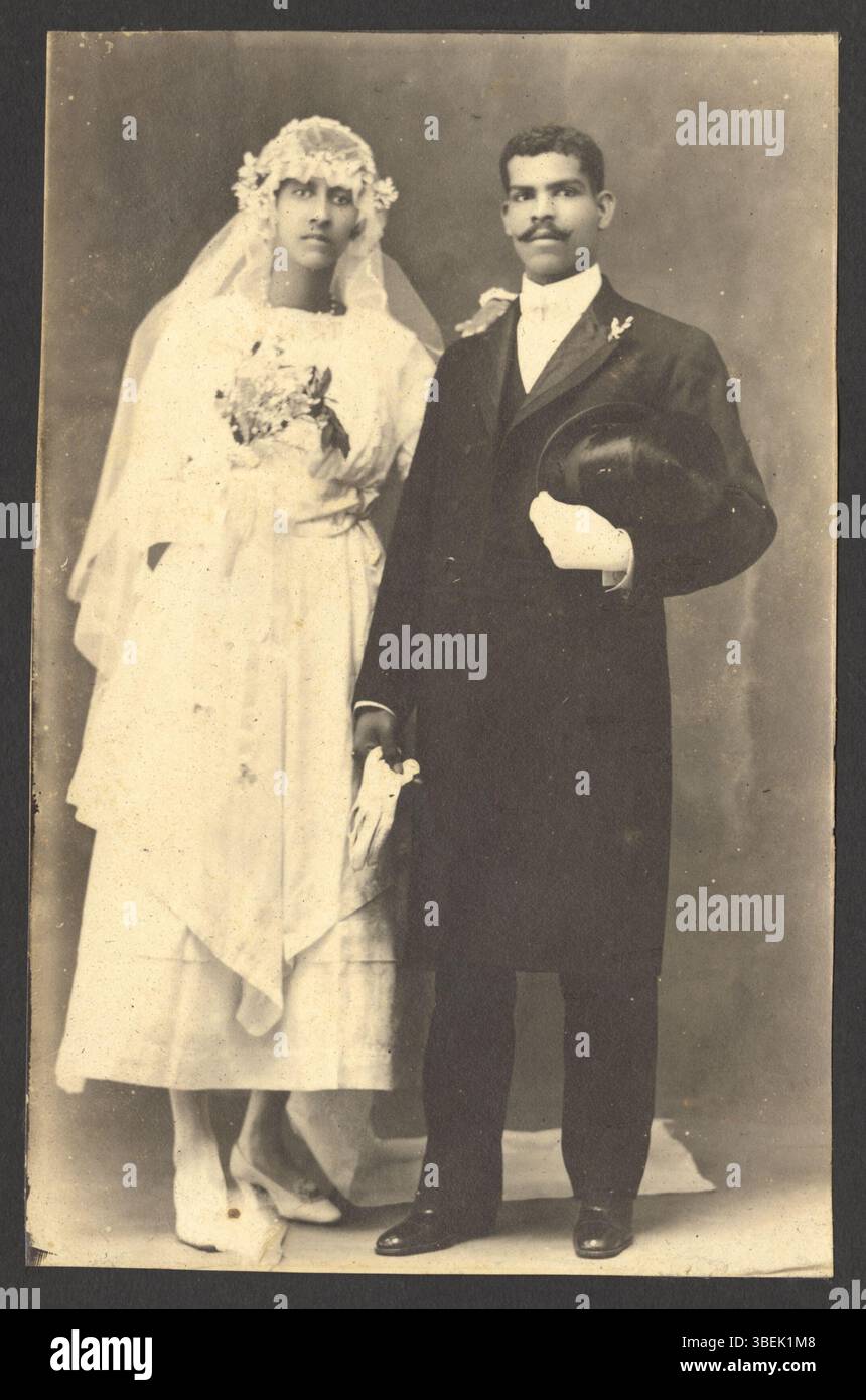A studio portrait from between 1900 and 1920, featuring a couple in ...