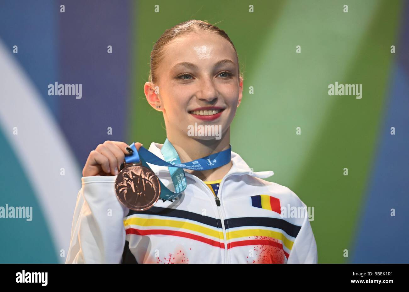 Romania's Ana Barbosu celebrates her overall bronze medal during the ...
