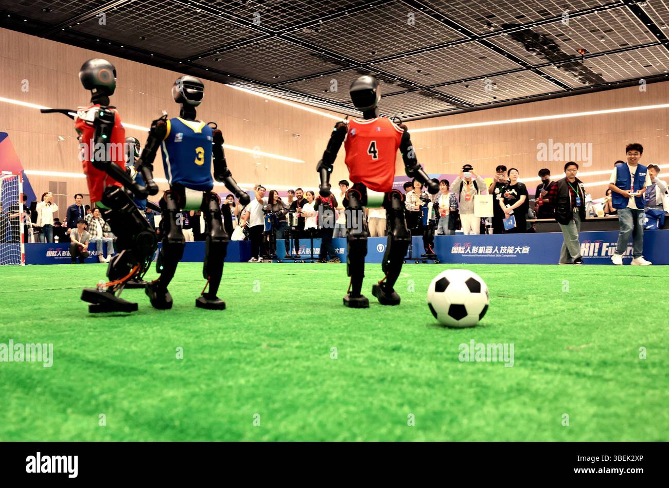Shanghai, China. 29th May, 2025. Robots "play" a football match during ...