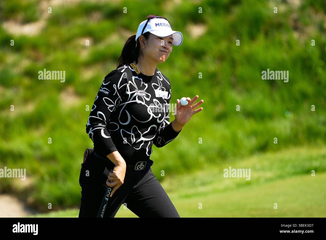 A Lim Kim, of South Korea, after putting on the 16th hole during the ...