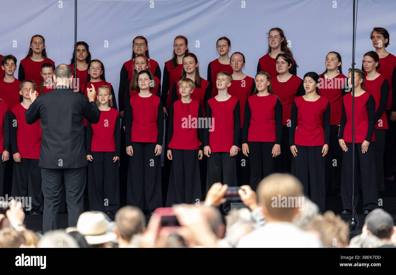 Nuremberg, Germany. 29th May, 2025. A youth choir sings at the opening ...